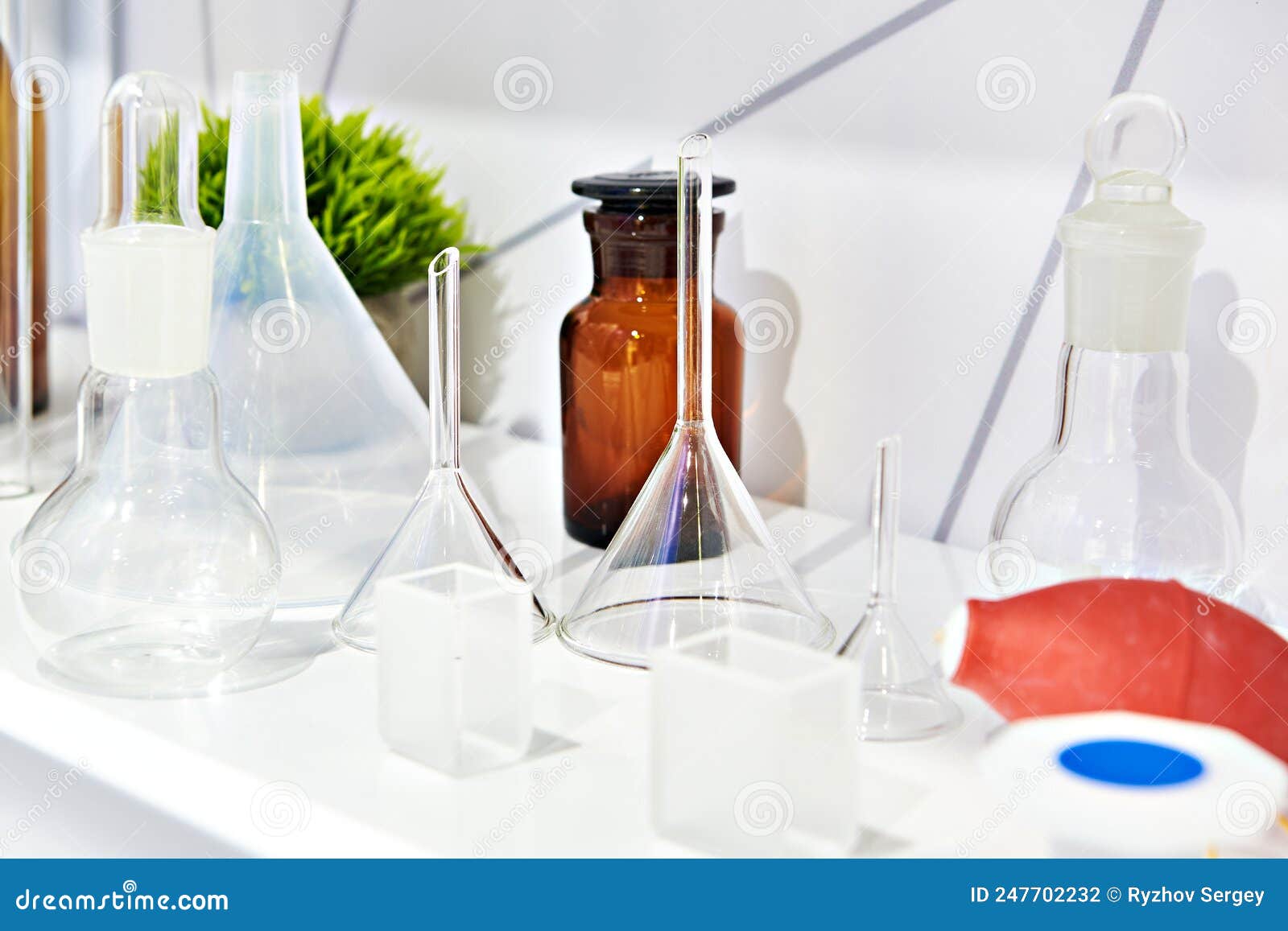 Laboratory Glass Funnels, Bottles and Flasks Stock Photo - Image of ...