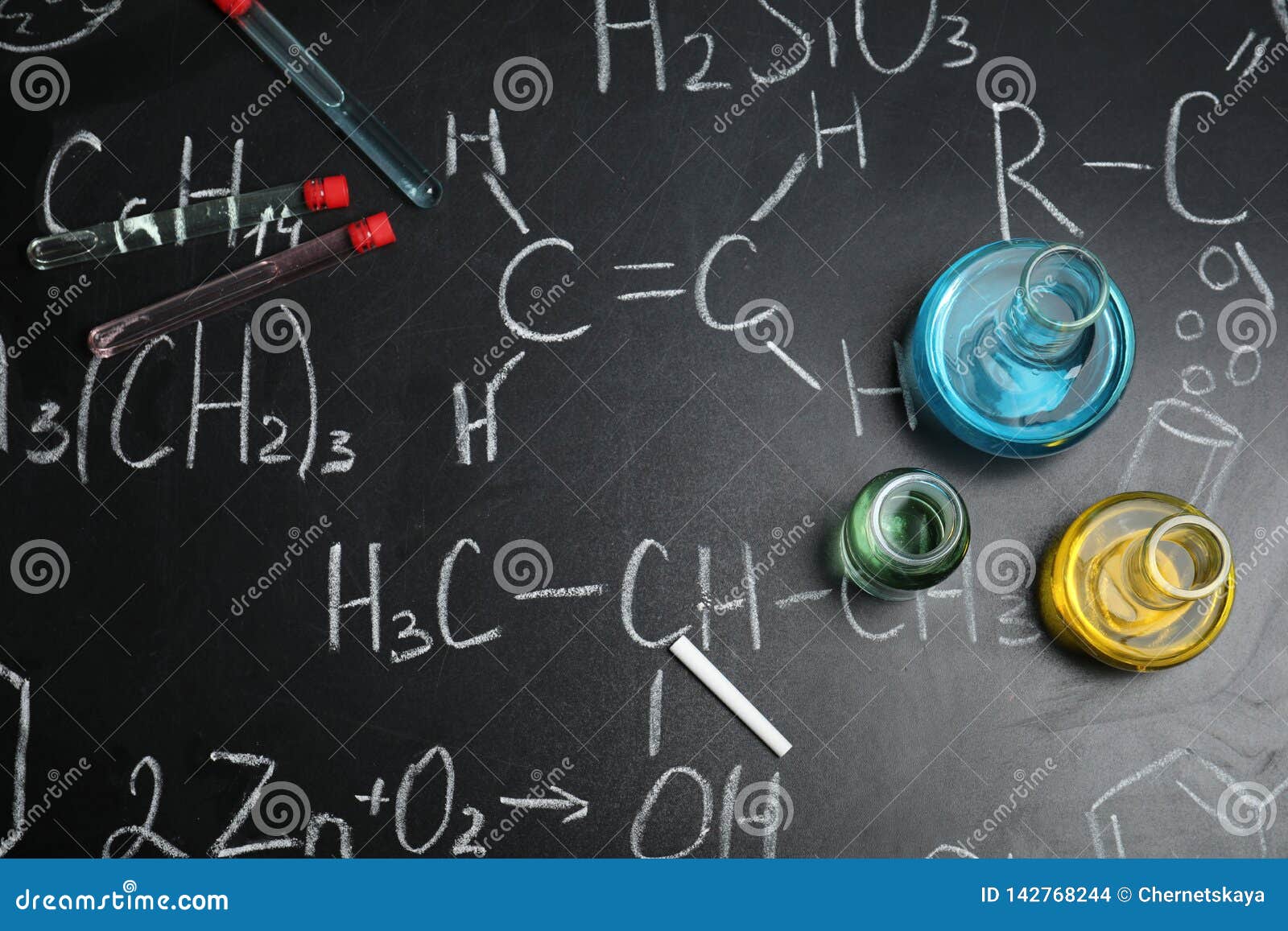 Laboratory Glassware on Blackboard with Chemical Formulas Stock Photo ...