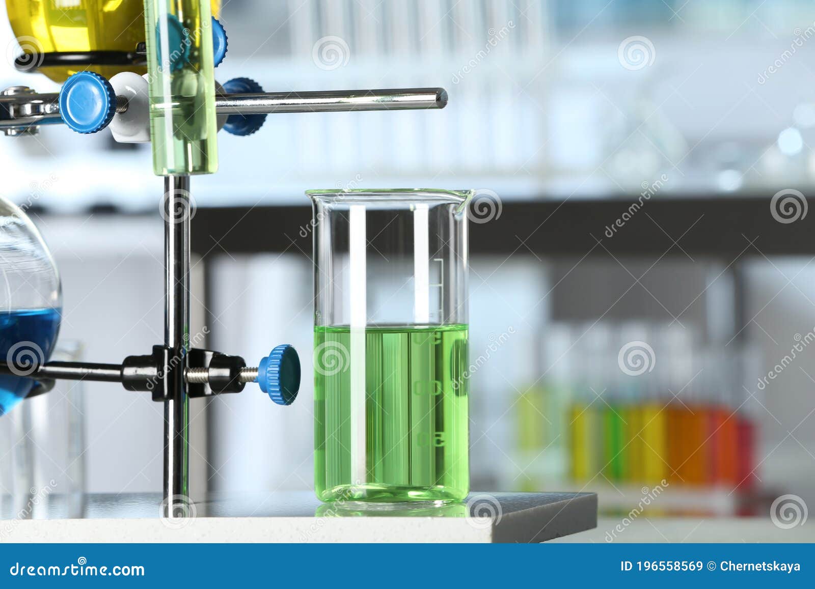 Laboratory Glassware with Different Liquid Samples, Focus on Beaker ...