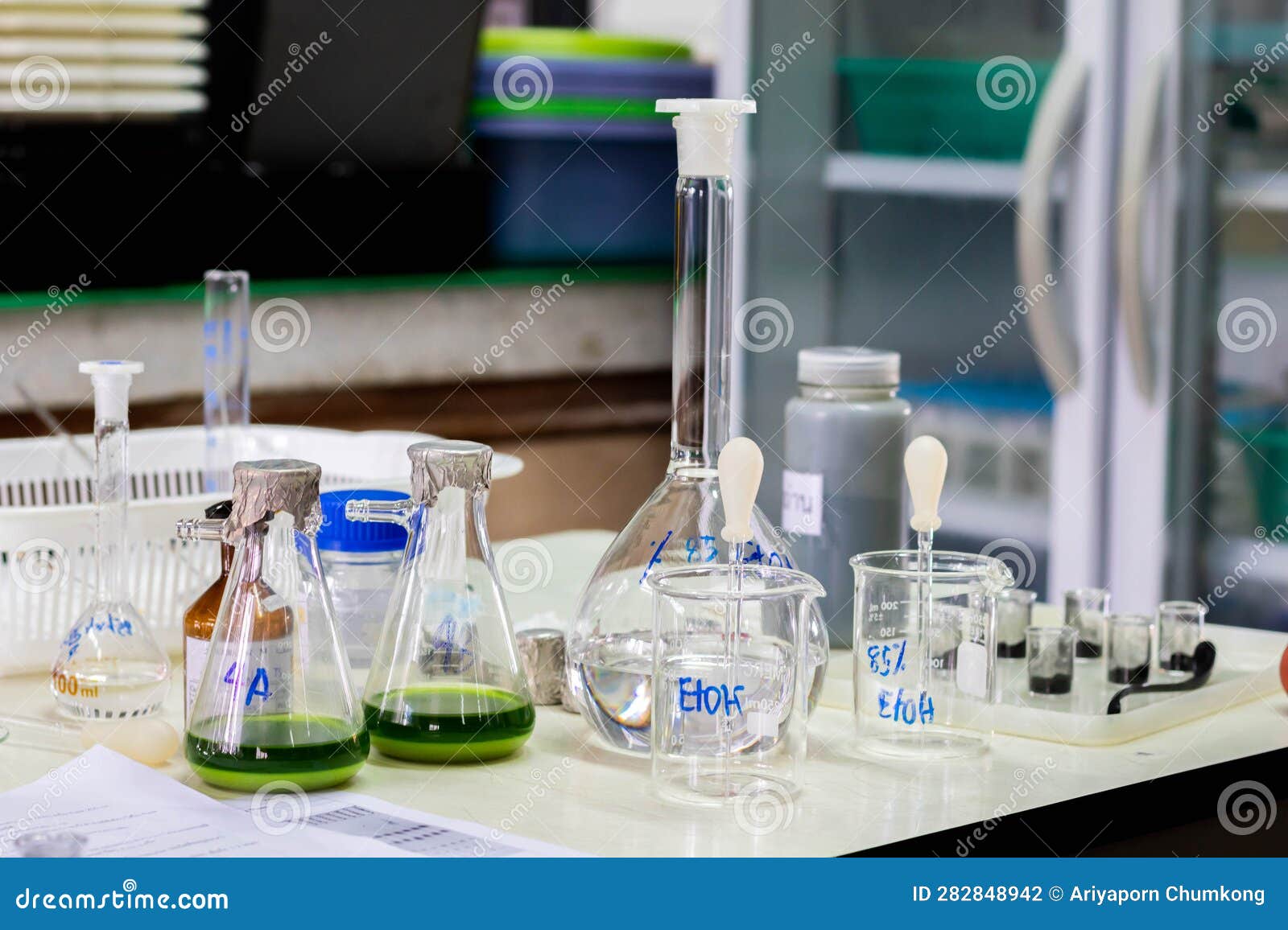 Laboratory Glassware with Green Liquid in a Science Research Laboratory ...