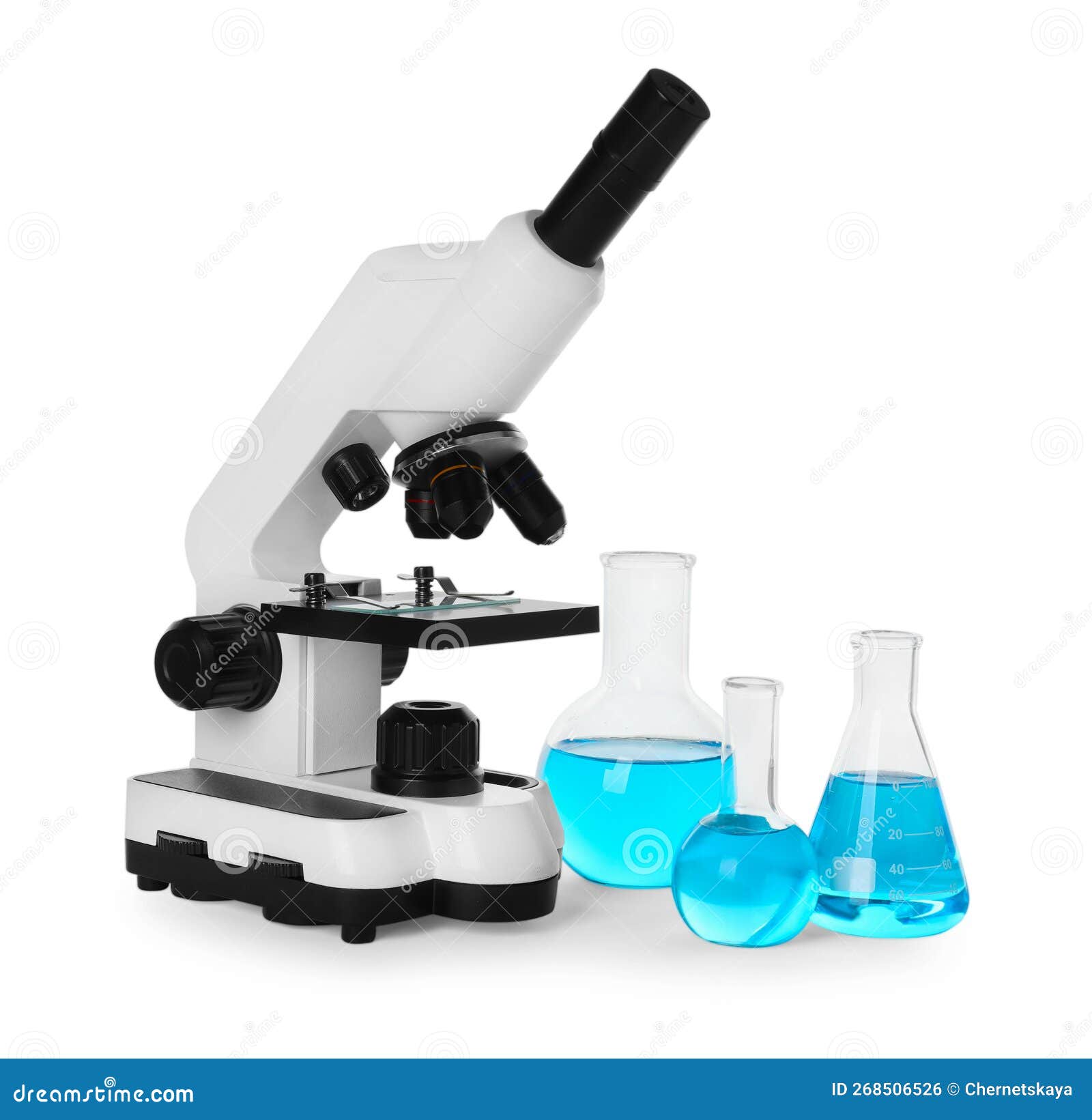 Laboratory Glassware with Light Blue Liquid and Microscope Isolated on ...