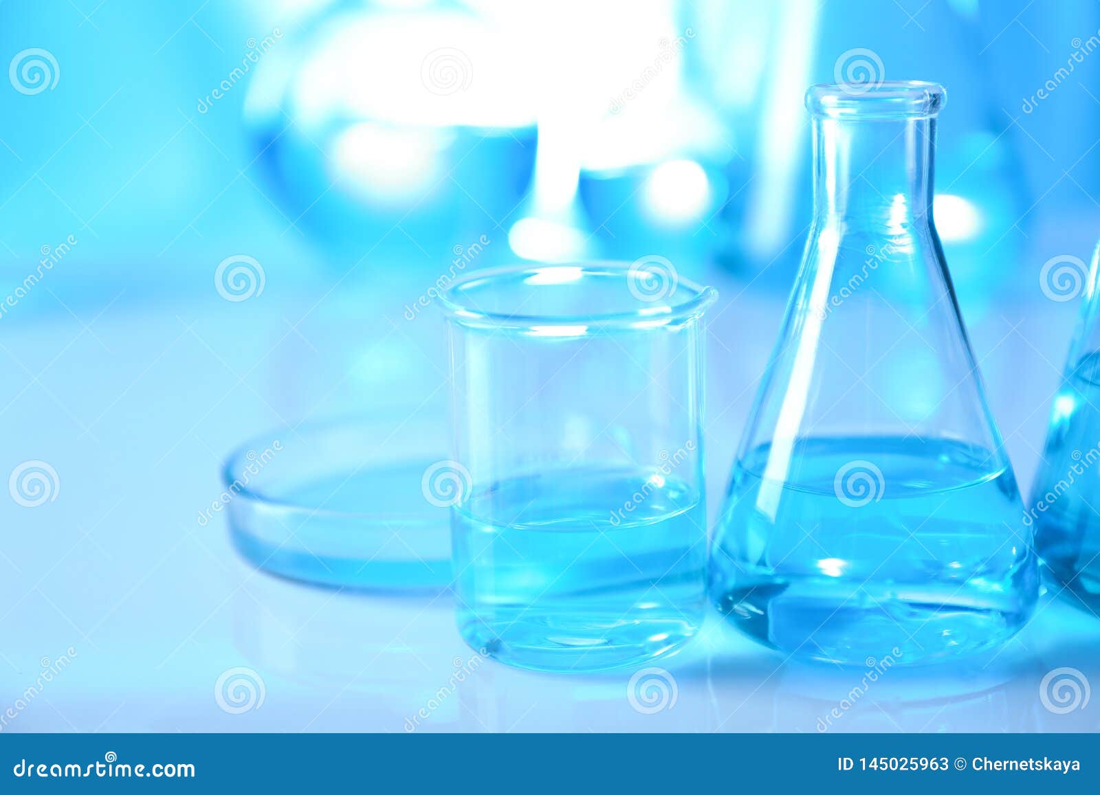 Laboratory Glassware with Liquid on Table. Stock Image - Image of petri ...