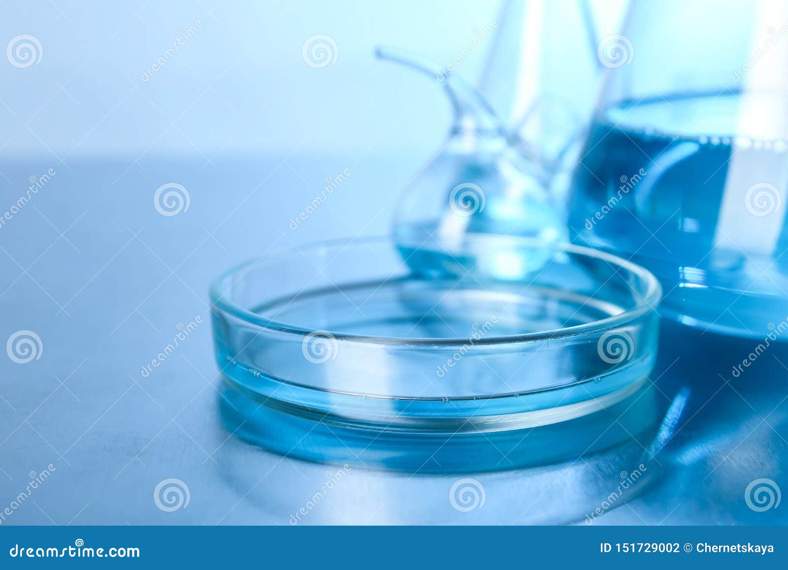 Laboratory Glassware with Liquid on Table. Solution Chemistry Stock ...