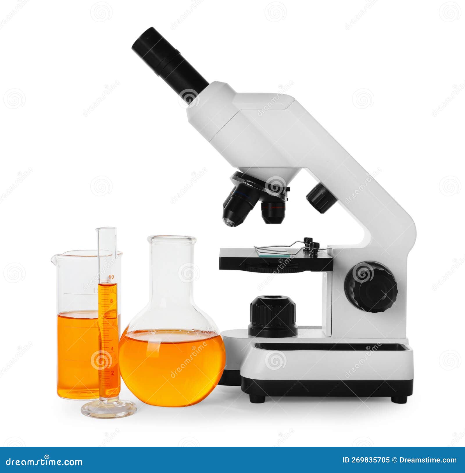 Laboratory Glassware with Orange Liquid and Microscope Isolated on ...