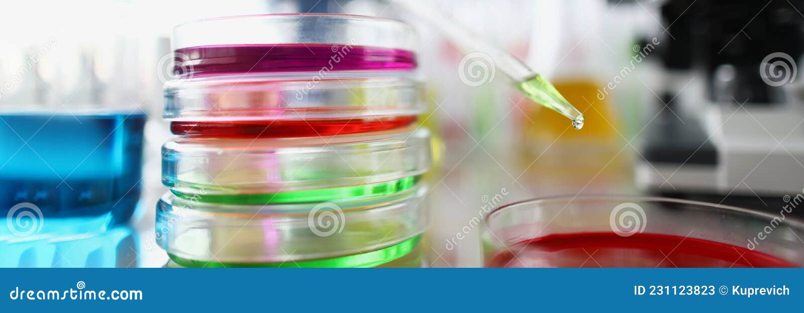 Laboratory Glassware with Solutions of Different Colors on Table Stock ...