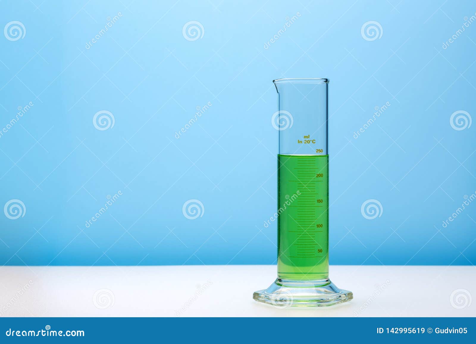 Laboratory Graduated Cylinder with Green Liquid. Copy Space Stock Image ...