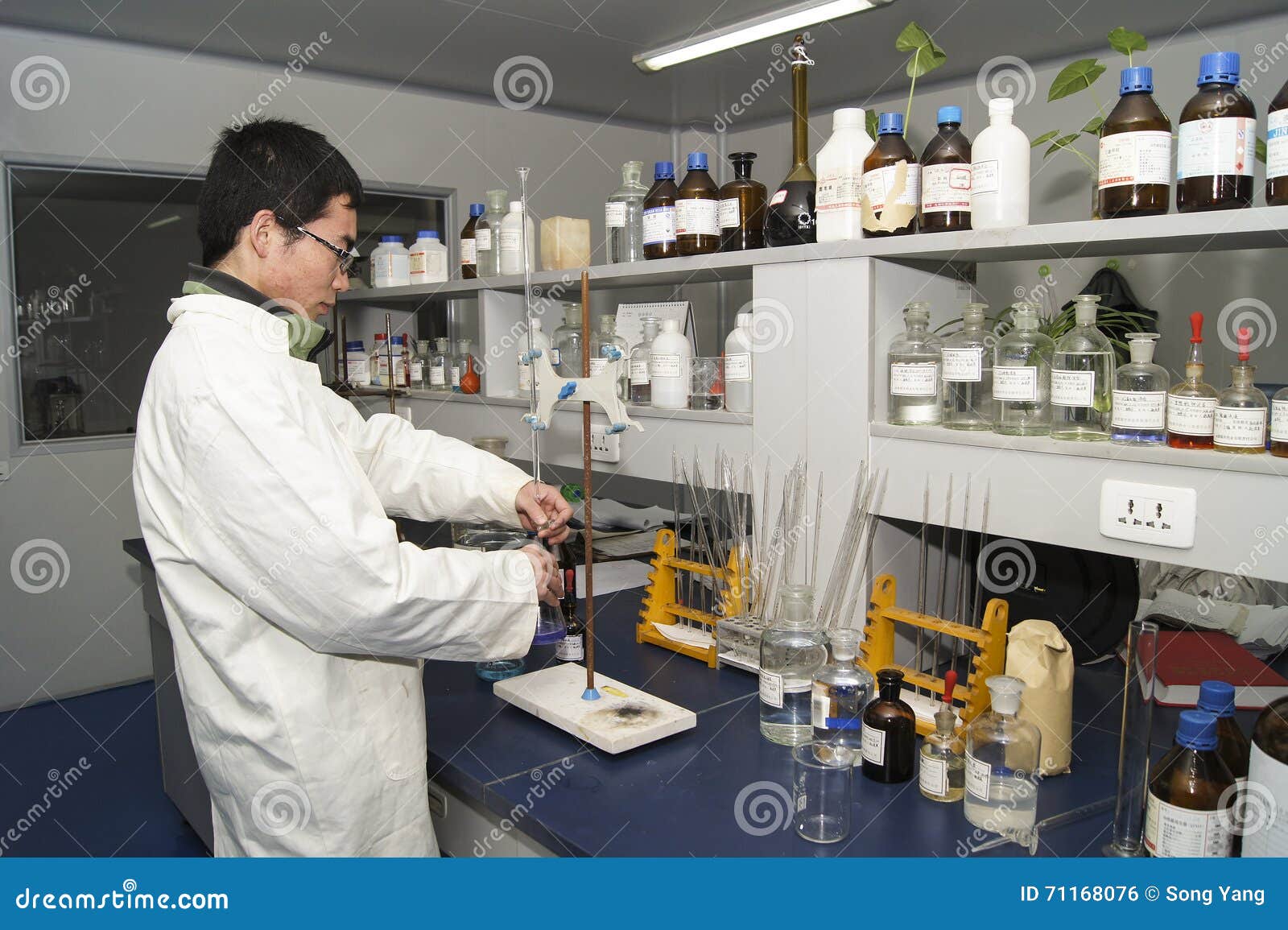 Laboratory man and machine editorial photo. Image of analysing - 71168076