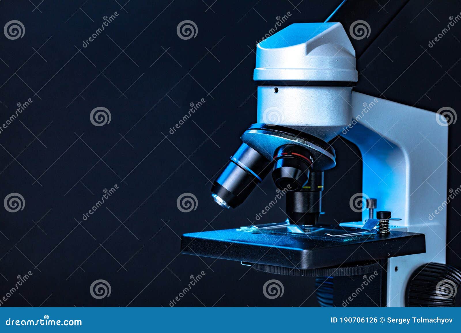 Microscope with Lenses Close Up Against Dark Background Stock Photo ...