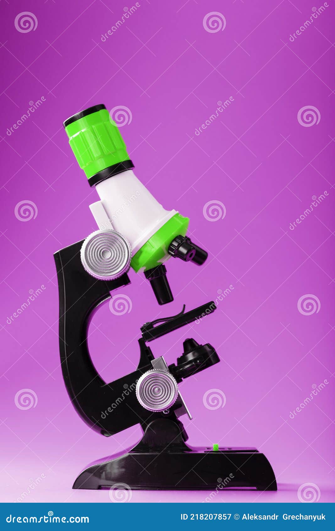 Laboratory Microscope on a Pink Background for Scientific Research on a ...