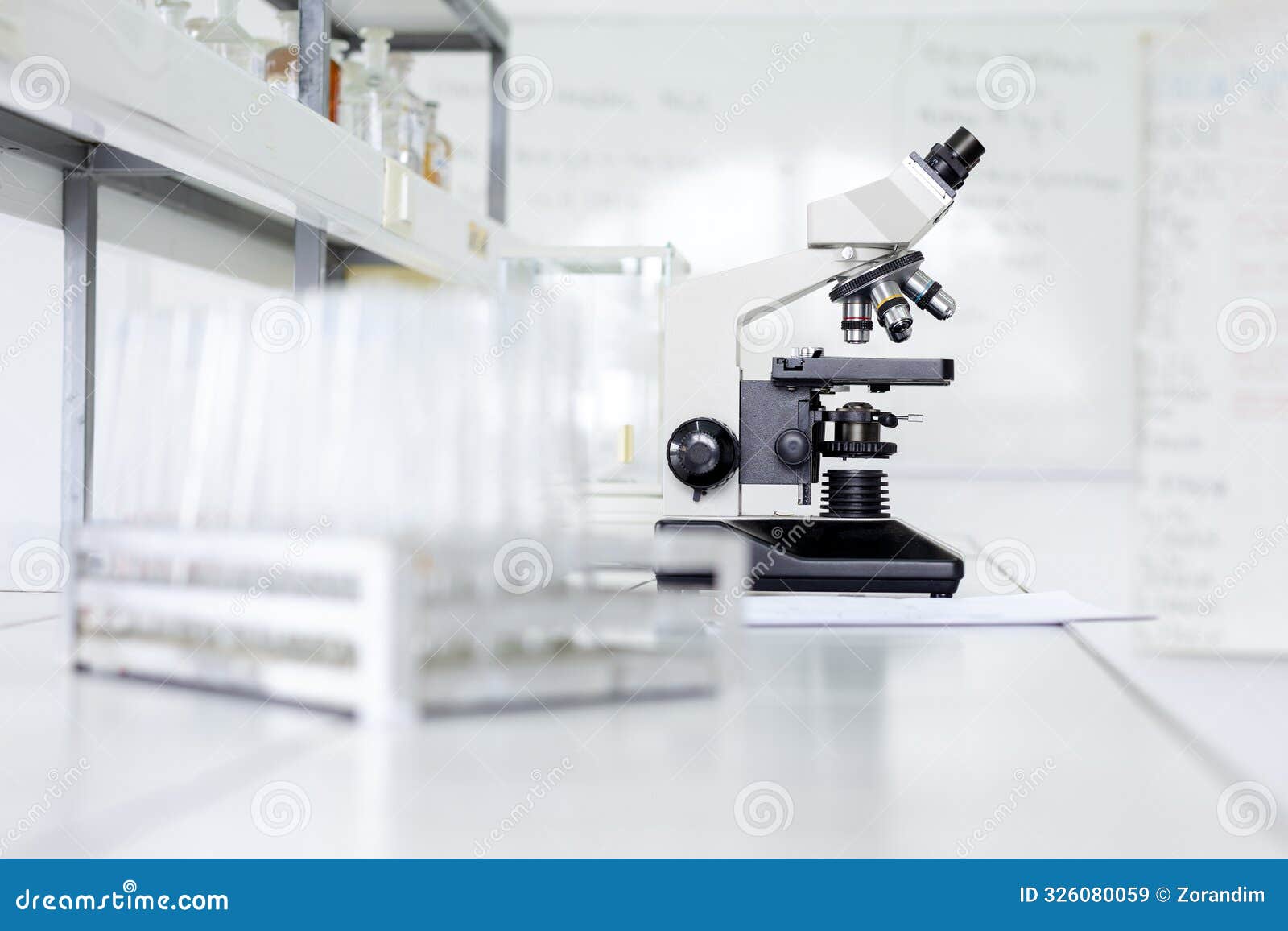 Laboratory Microscope with Test Tubes on a Workbench Stock Image ...