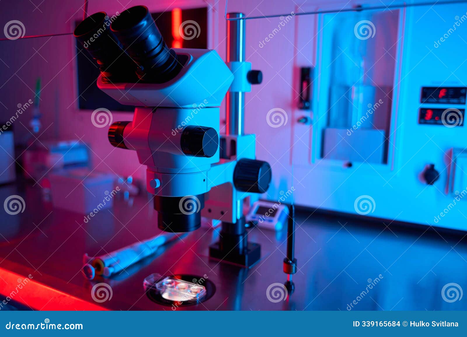 Laboratory Microscope Under Contrasting Red and Blue Light Stock Photo ...