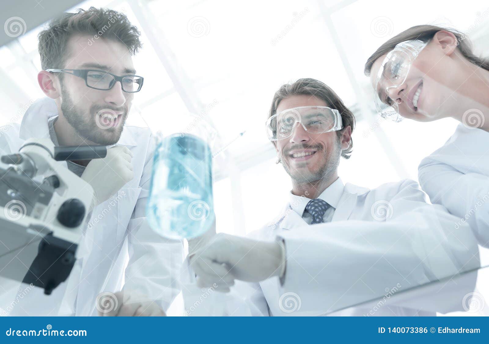 Group of Scientists Working on an Experiment at the Laboratory Stock ... Group of Scientists Working on an Experiment at the Laboratory Stock ...