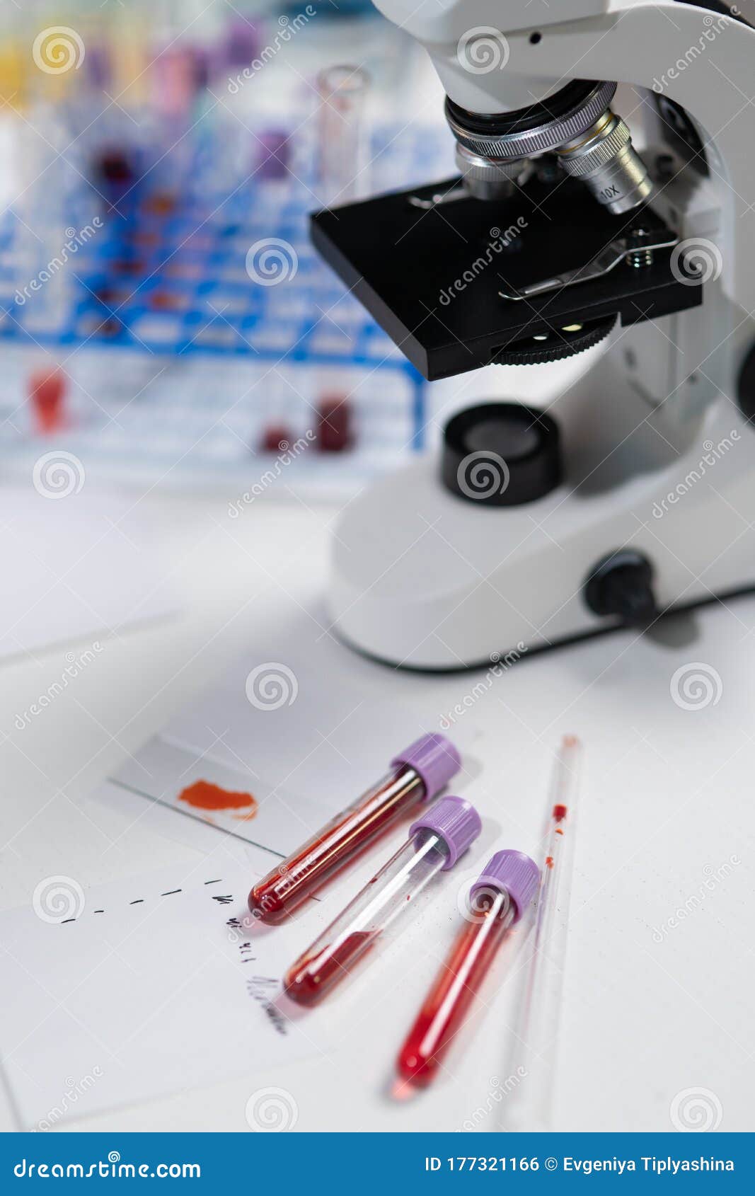 Microscope with Test Tubes on a Laboratory Bench Stock Photo - Image of ...