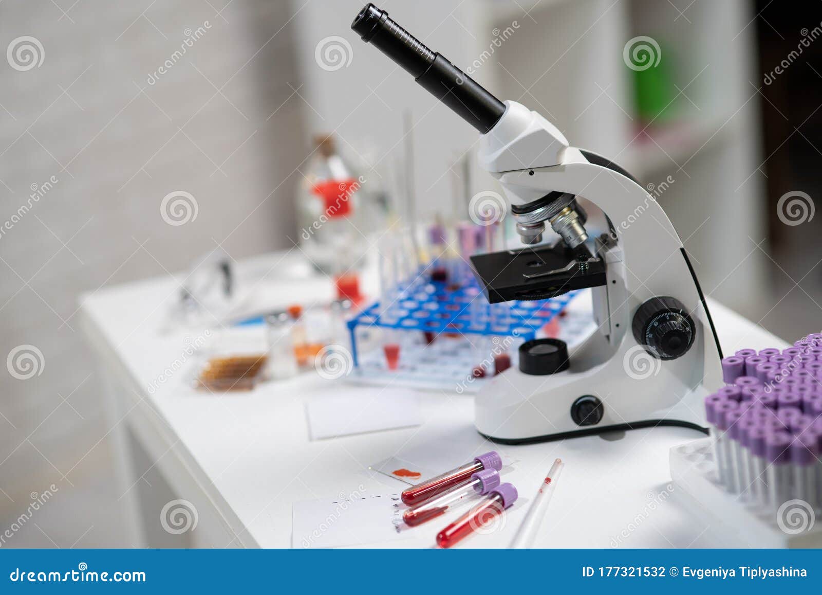 Microscope with Test Tubes on a Laboratory Bench Stock Photo - Image of ...