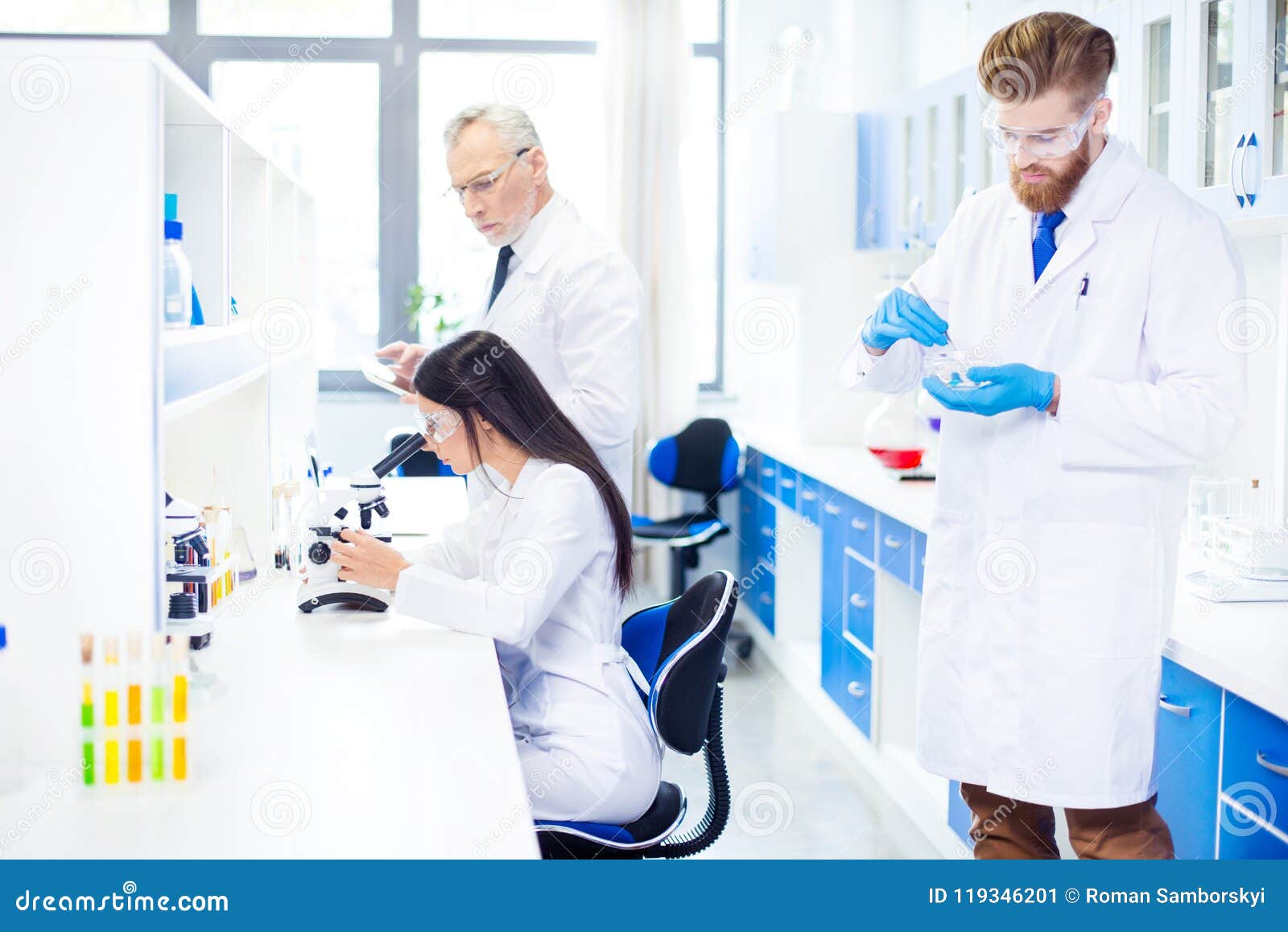 Laboratory Teamwork. Group of Three is Working for New Project Stock ...