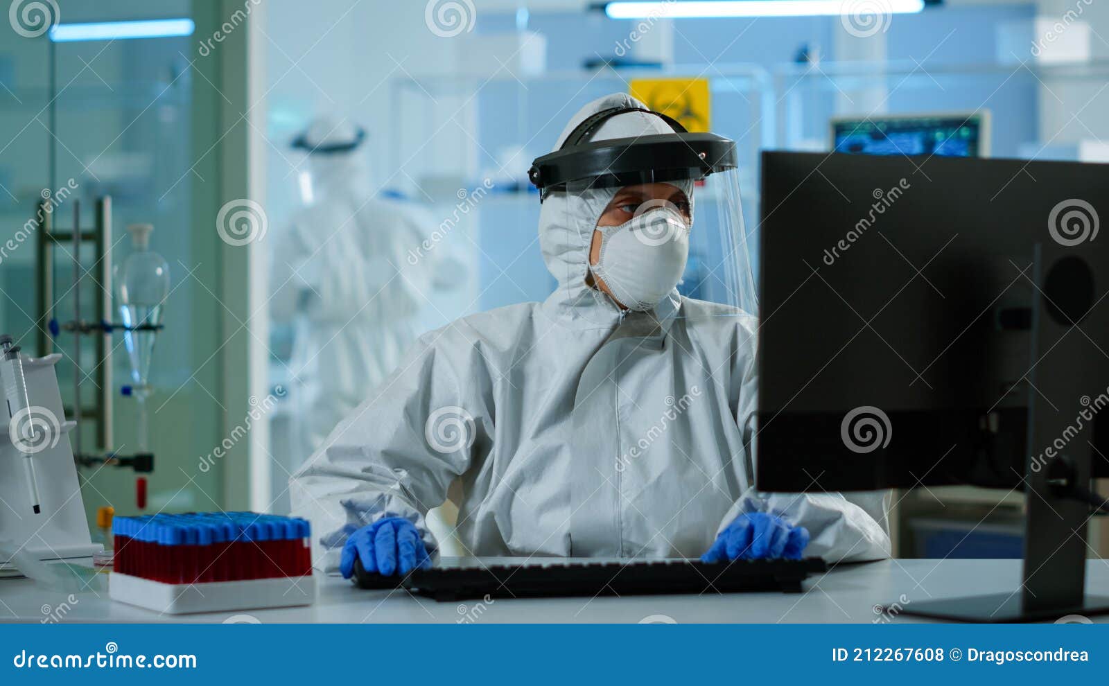 Laboratory Technician Assistant in Ppe Suit Analyzing Blood Sample ...