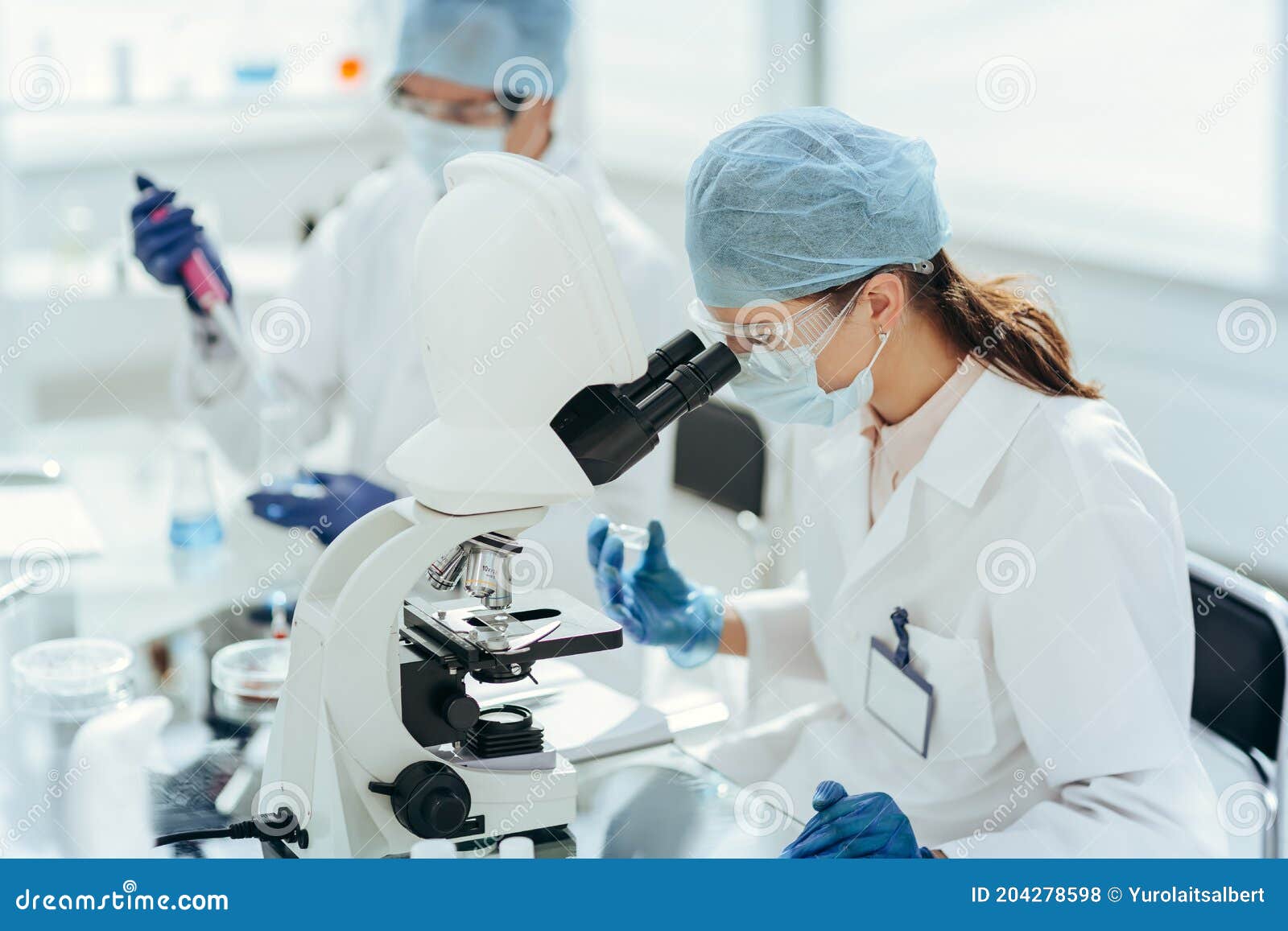 Laboratory Technician Conducts Testing in the Laboratory . Stock Photo ...