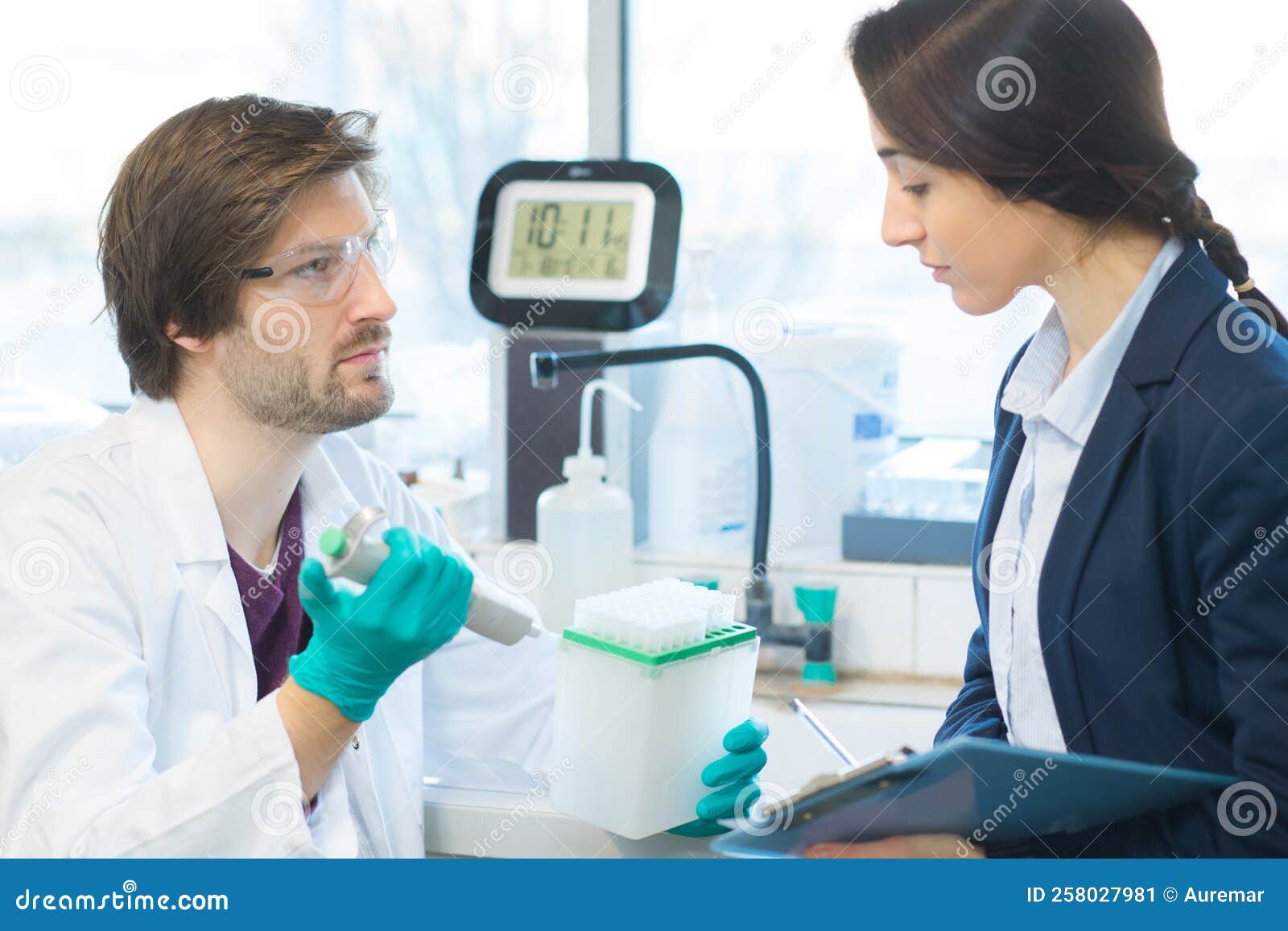 Laboratory Technician Holding Plastic Container and Pipette Stock Image ...
