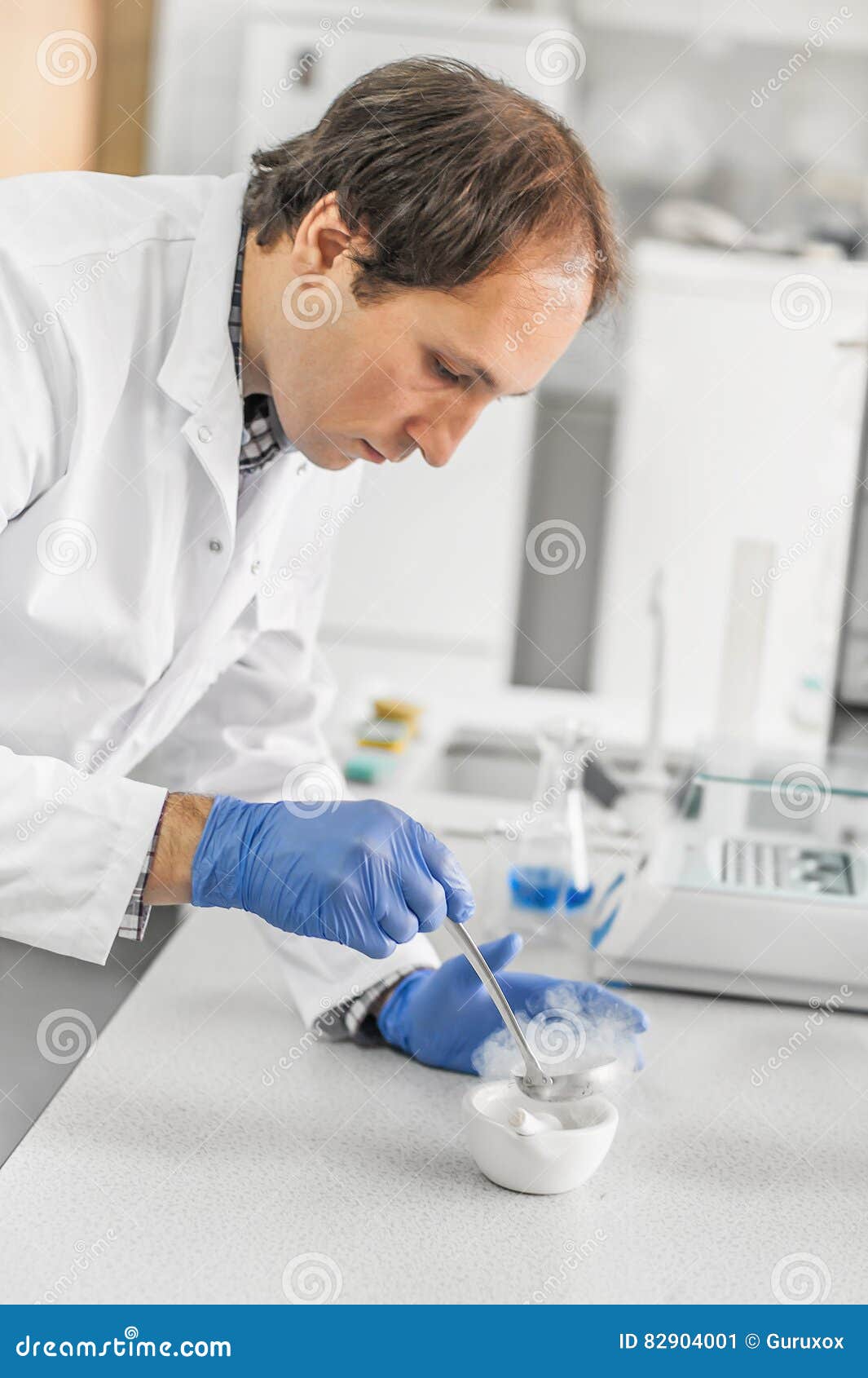 Laboratory Technician Performs an Experiment with Liquid Nitrogen Stock ...