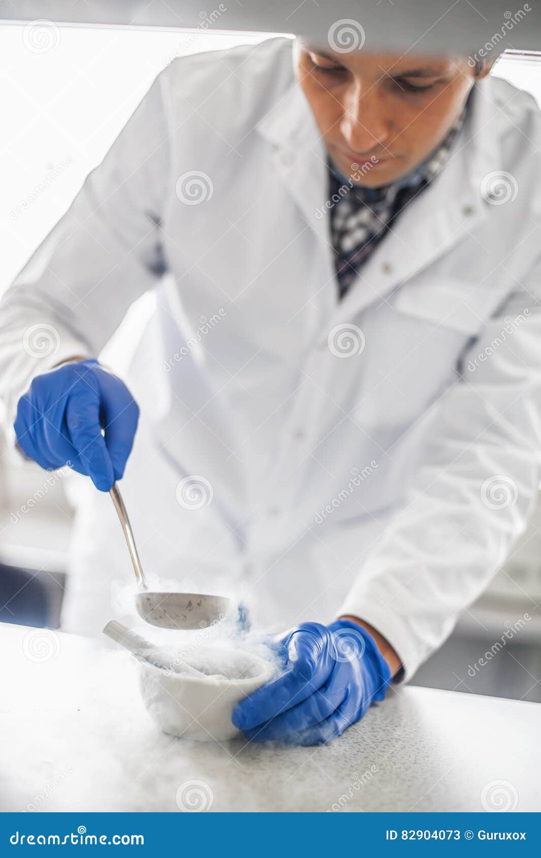 Laboratory Technician Performs an Experiment with Liquid Nitrogen Stock ...