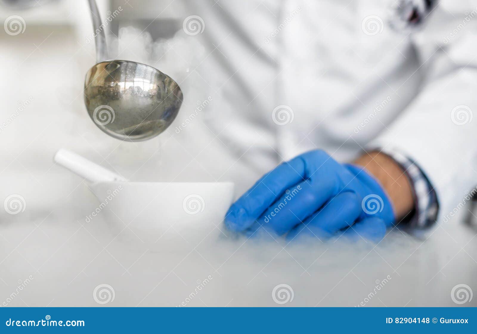 Laboratory Technician Performs an Experiment with Liquid Nitrogen Stock ...