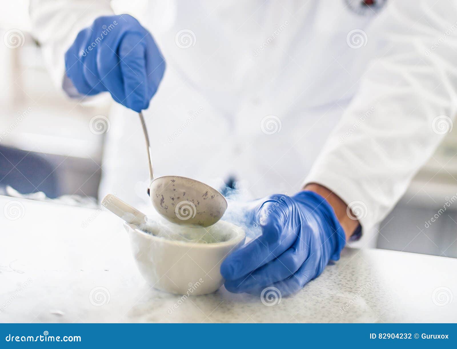 Laboratory Technician Performs an Experiment with Liquid Nitrogen Stock ...