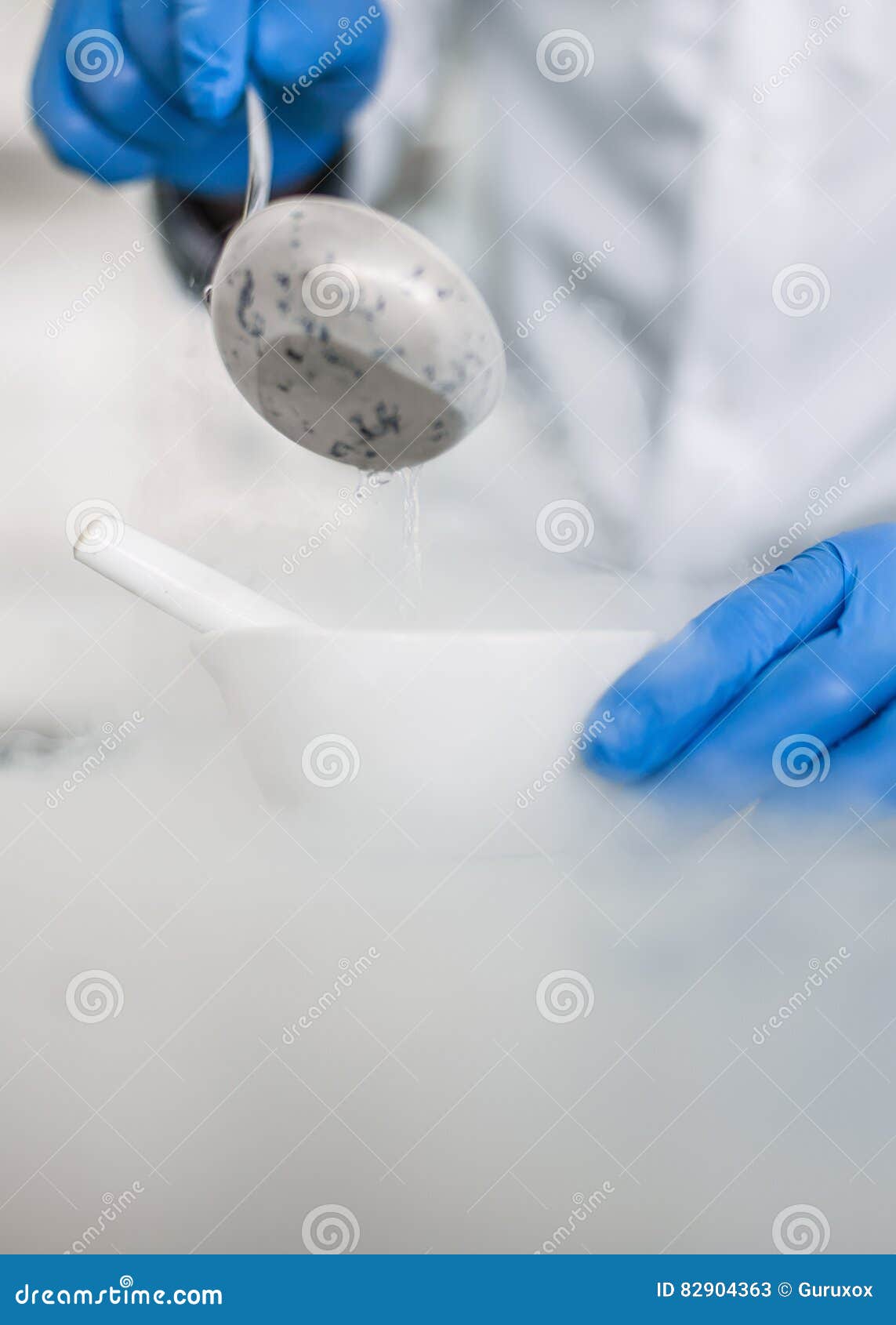 Laboratory Technician Performs an Experiment with Liquid Nitrogen Stock ...