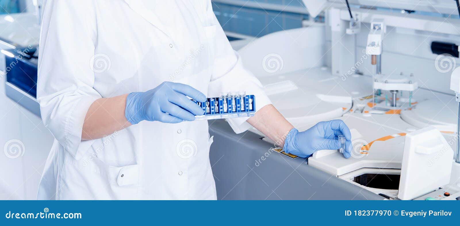 Laboratory Technician Sets Test Sample in Automatic Express Tester ...