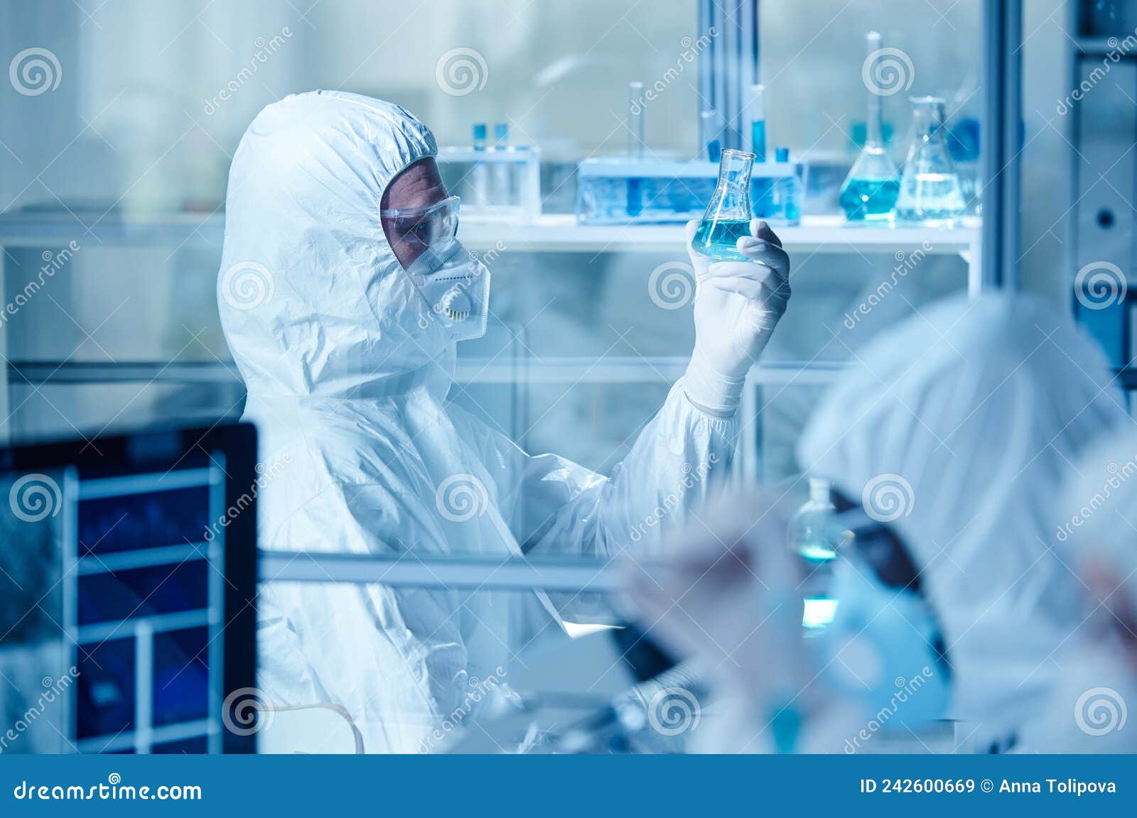 Laboratory Technician Working in Protective Suit in Lab Stock Image ...