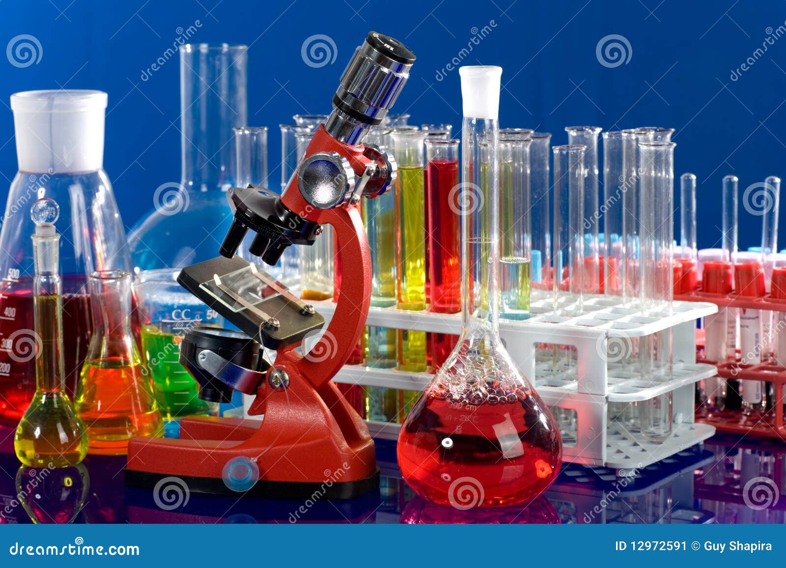 Laboratory Ware and Microscope Stock Image - Image of flask, macro ...