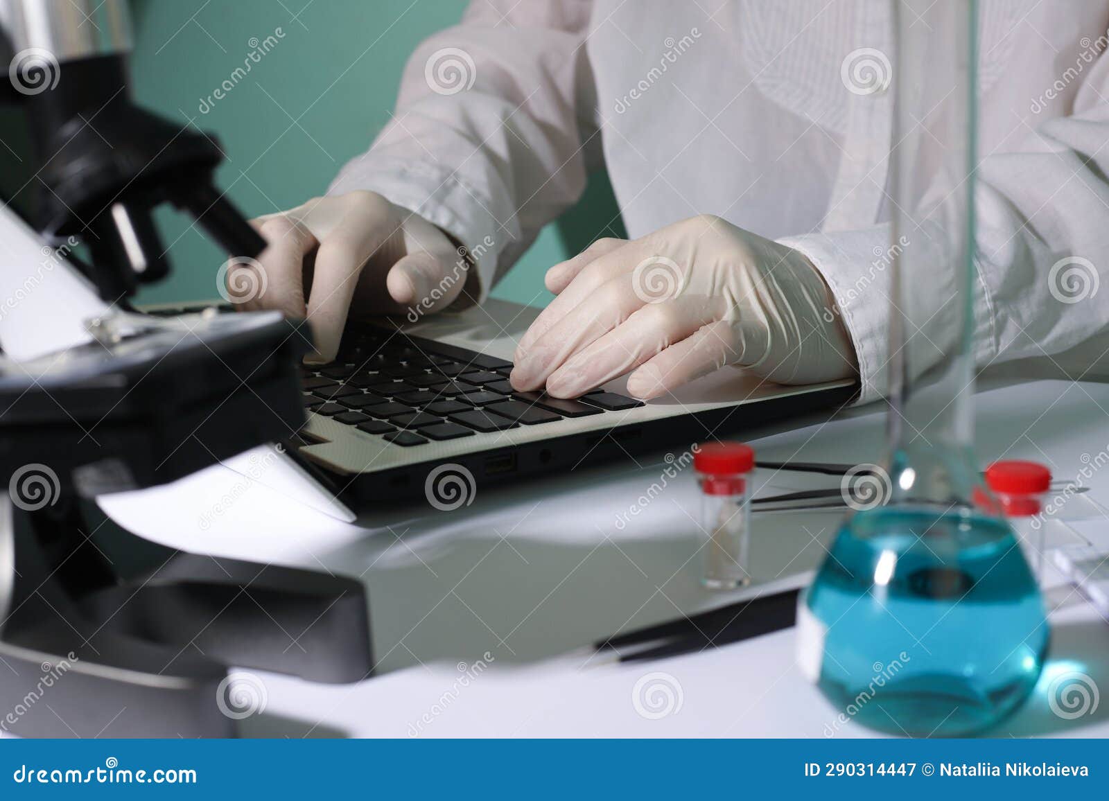 Laboratory. White Table, Hands of a Laboratory Assistant in White ...