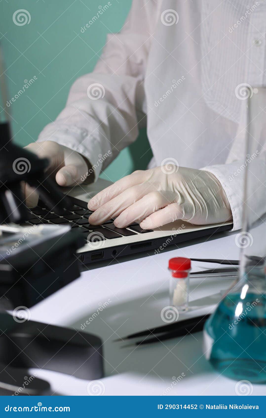 Laboratory. White Table, Hands of a Laboratory Assistant in White ...