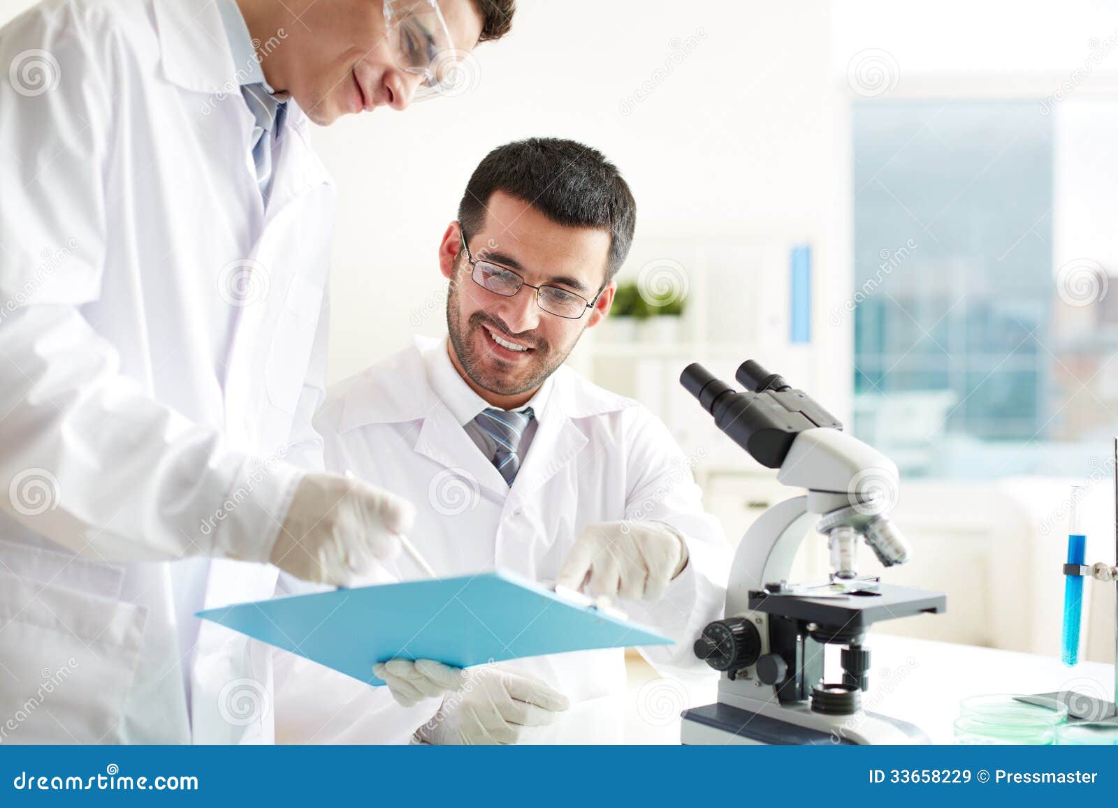 Laboratory work stock image. Image of gloved, people - 33658229