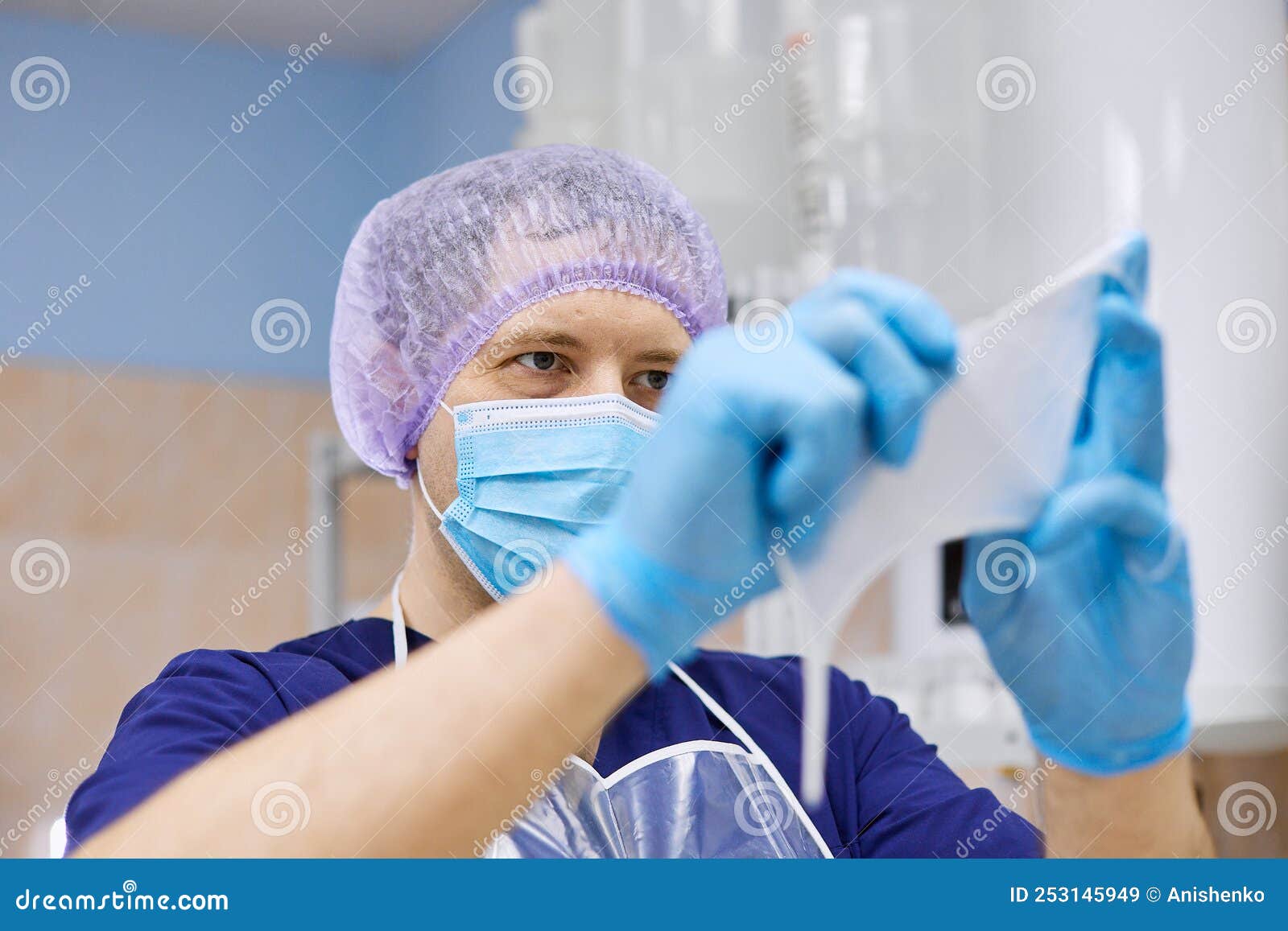 A Laboratory Worker Checks the Condition of the Samples before Testing ... A Laboratory Worker Checks the Condition of the Samples before Testing ...