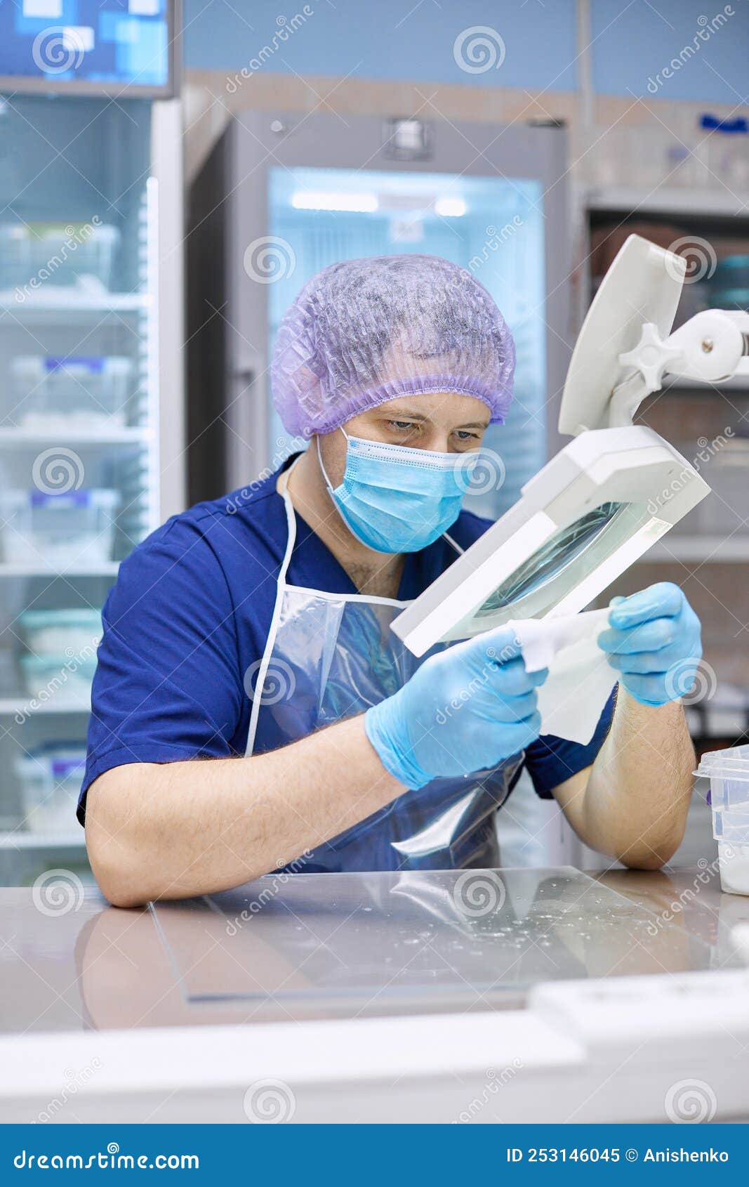 A Laboratory Worker Checks the Condition of the Samples before Testing ...