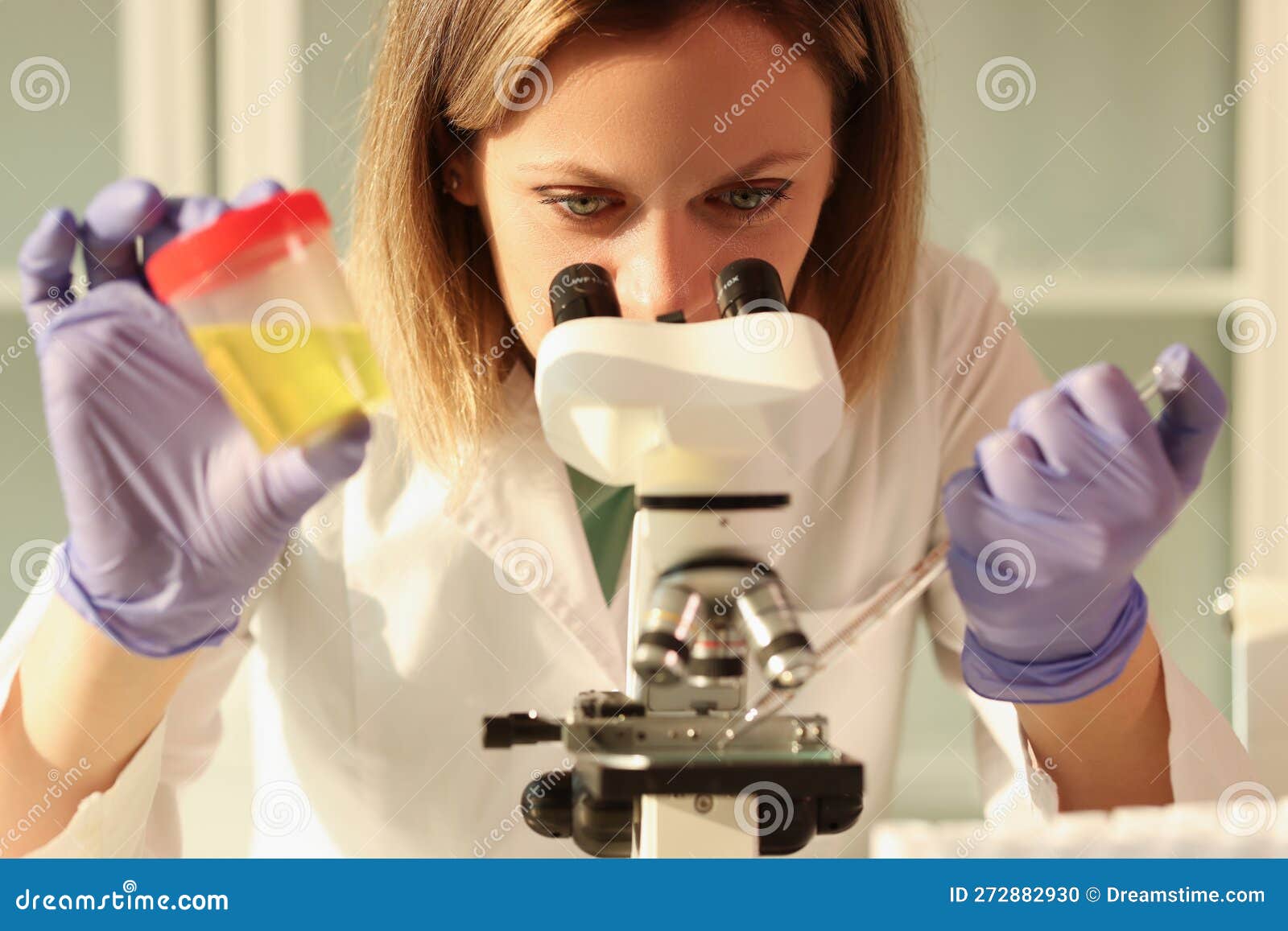 Laboratory Worker Does Urine Test Using Modern Microscope Stock Photo ...