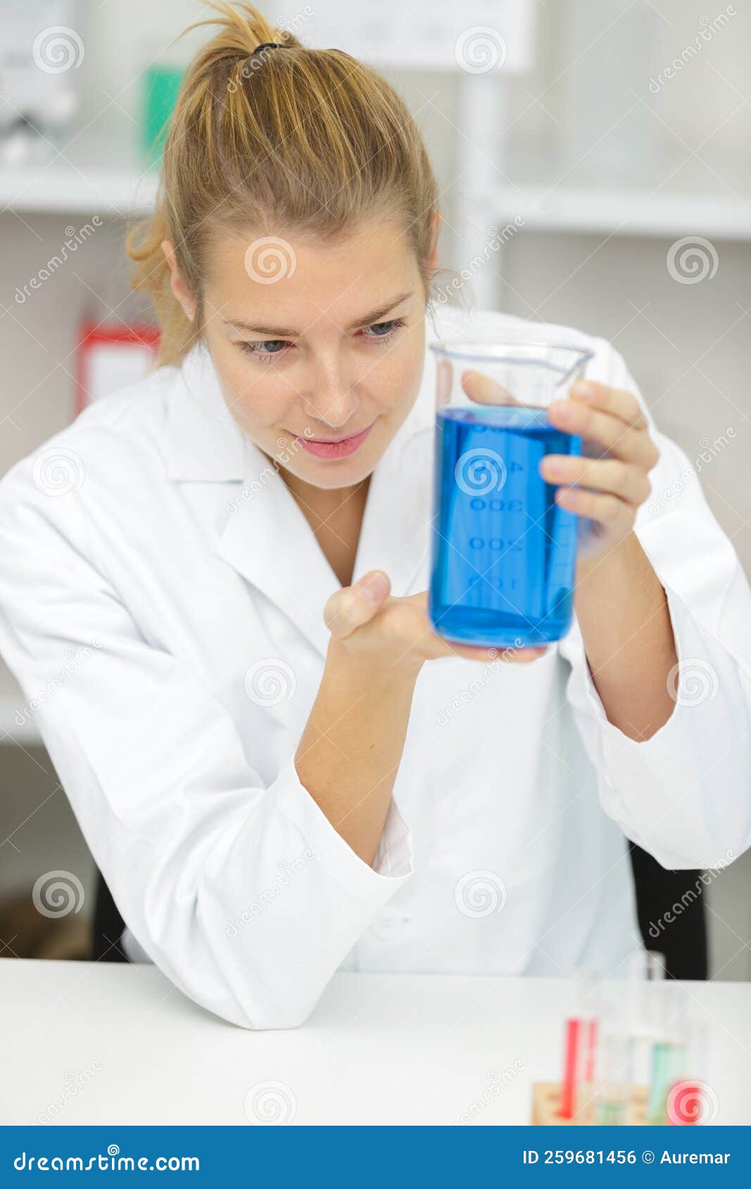Laboratory Worker Experimenting with Flask Containers Stock Photo ...
