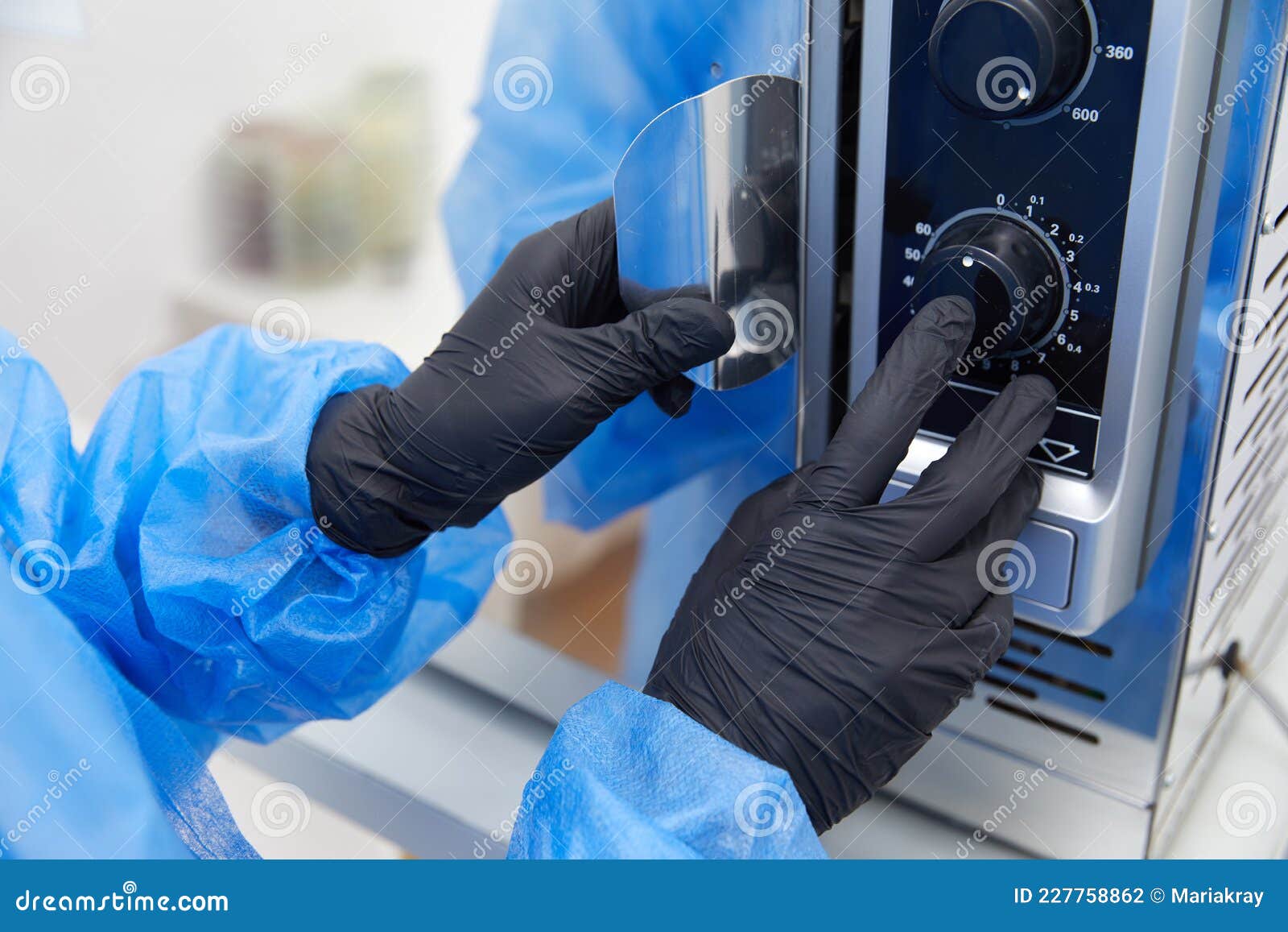 Laboratory Worker Operating Modern Laboratory Autoclave Sterilizer ...