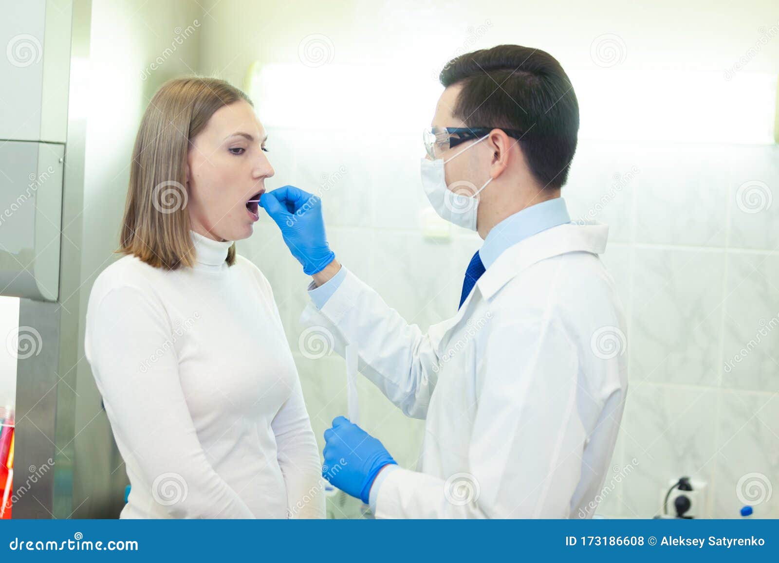 Laboratory Worker Performing DNA Paternity Test in a Medical Laboratory ...
