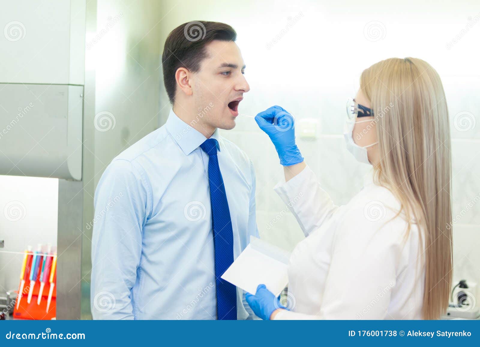 Laboratory Worker Performing DNA Paternity Test in a Medical Laboratory ...