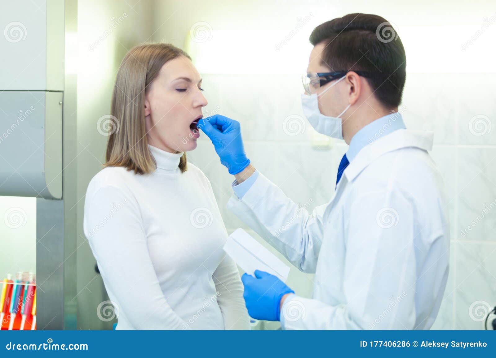 Laboratory Worker Performing DNA Paternity Test in a Medical Laboratory ...