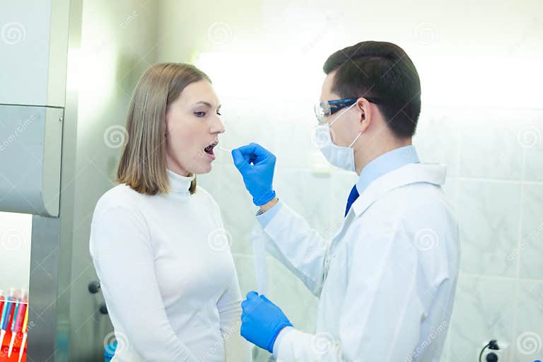 Laboratory Worker Performing DNA Paternity Test in a Medical Laboratory ... Laboratory Worker Performing DNA Paternity Test in a Medical Laboratory ...