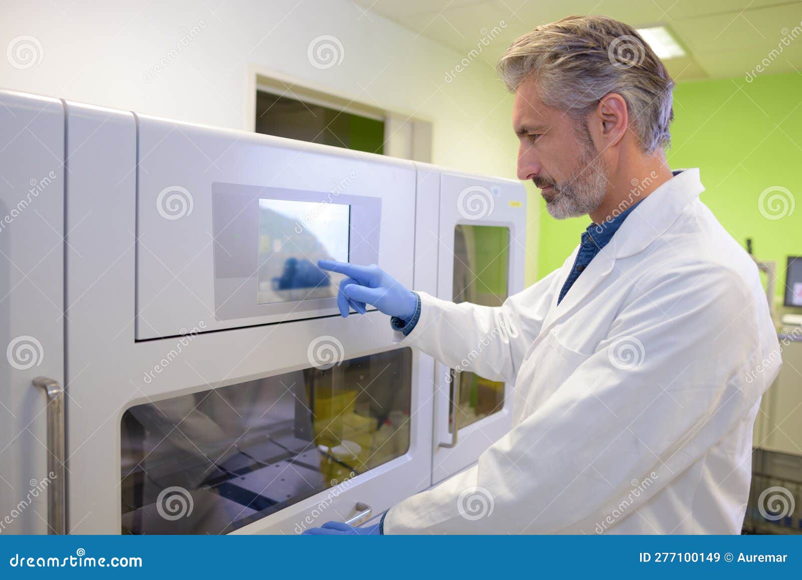 Laboratory Worker Pointing Inside Machine Stock Image - Image of ...