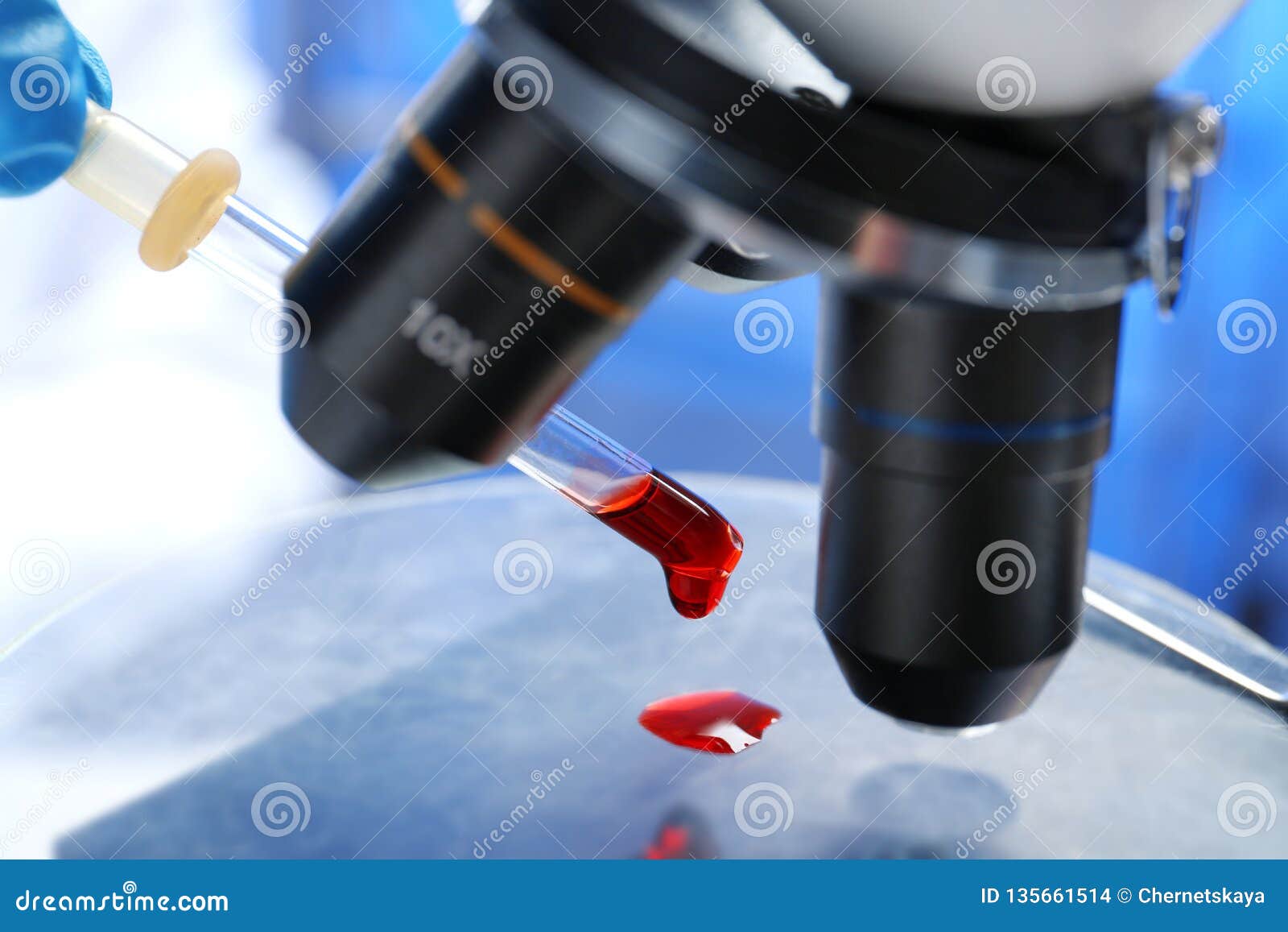 Laboratory Worker Running Blood Test Using Microscope, Closeup. Stock ...