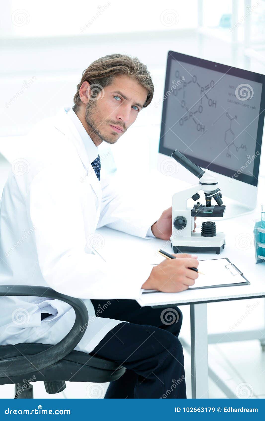 Laboratory Worker Sitting by Table with Microscope Stock Image - Image ...