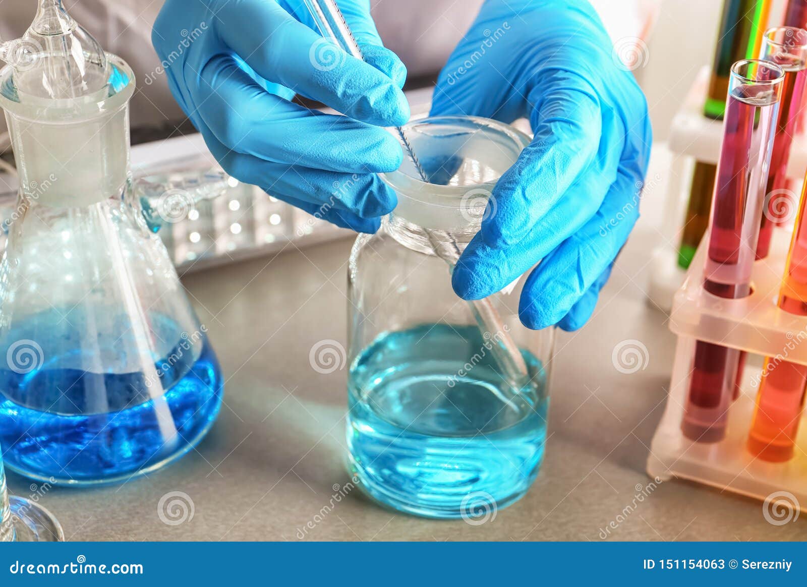 Laboratory Worker Taking Sample from Bottle, Closeup Stock Image ...