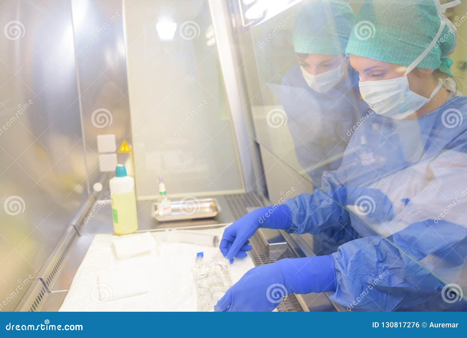 Laboratory Workers Reaching through Screen Stock Photo - Image of ...