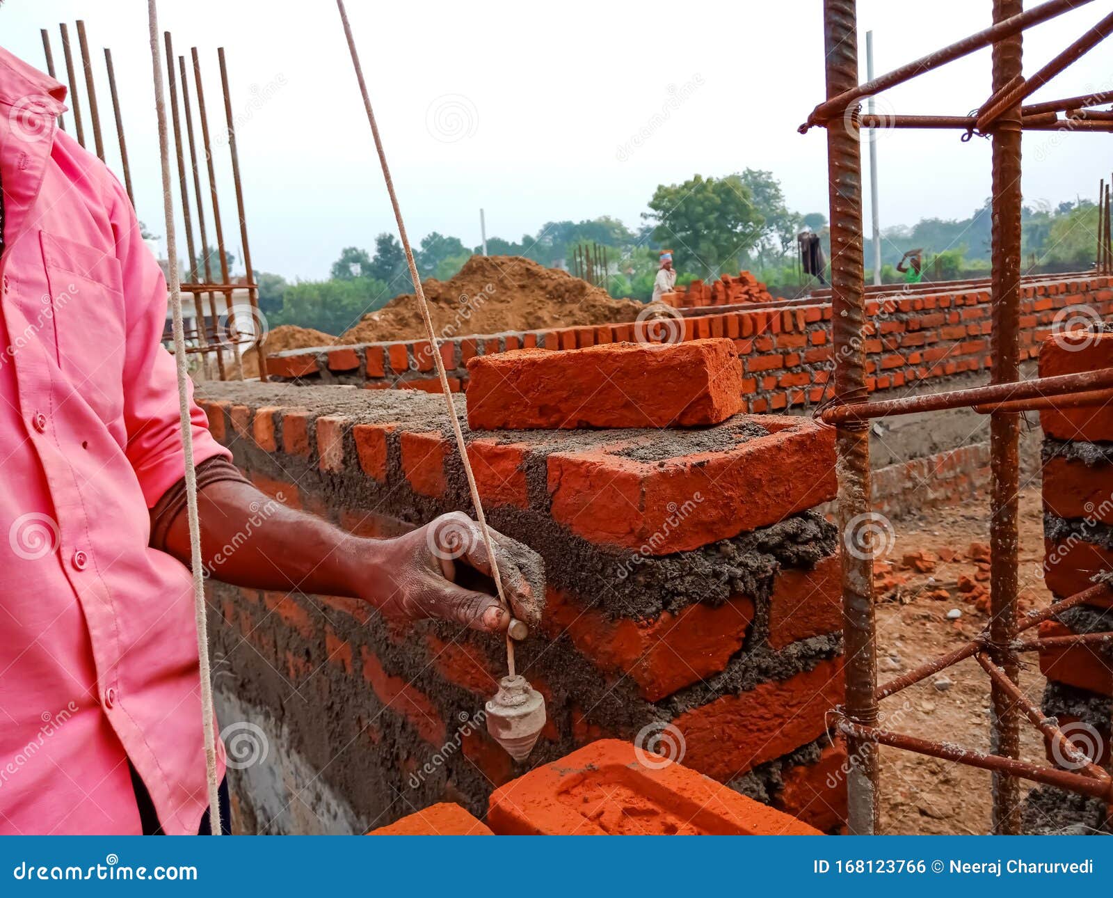 Labour Hand Taking Wall Measurements during Construction Work at Site ...