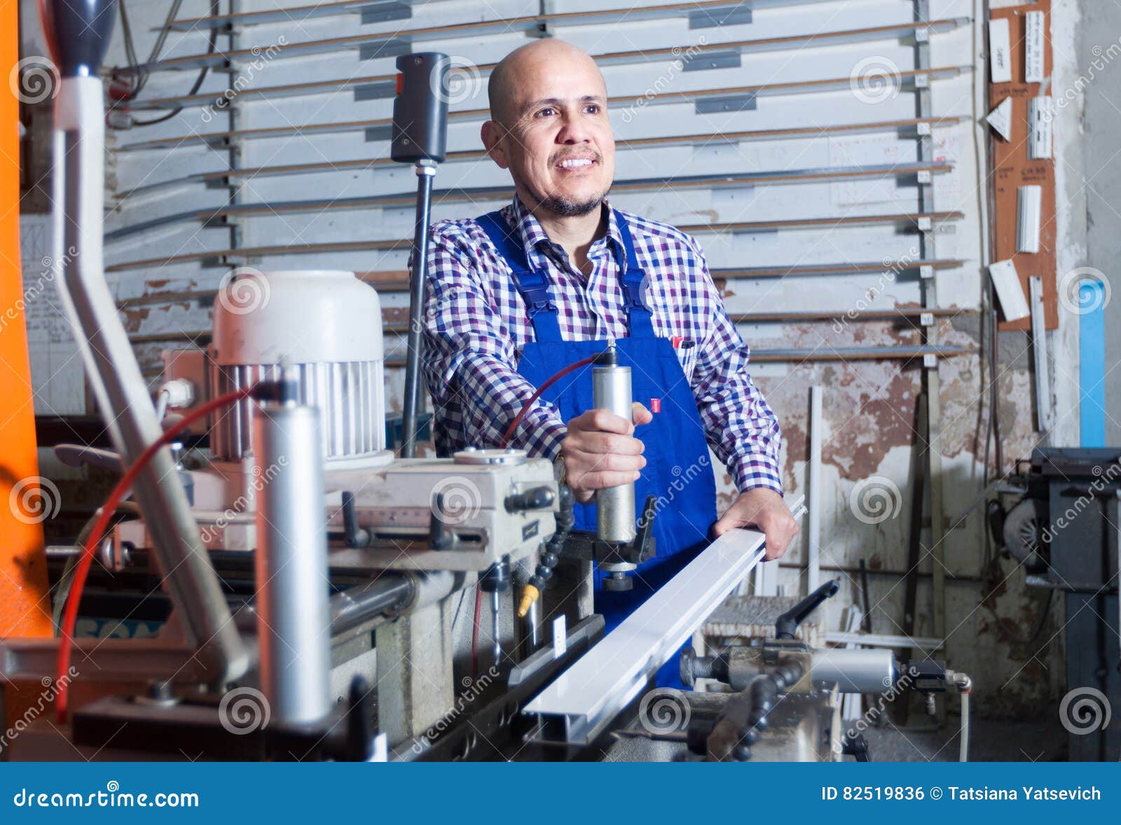 Labour Working in Uniform on Lathe Machine at Factory Stock Photo ...