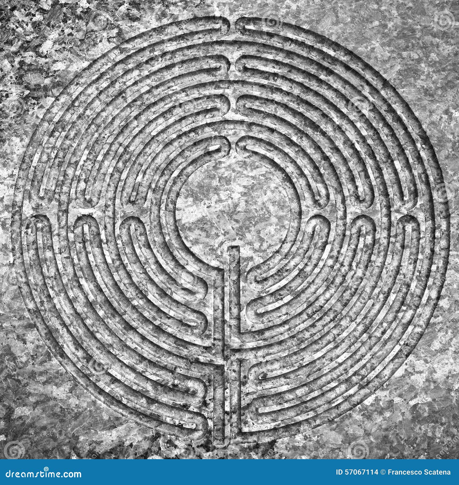 Labyrinth carved on stone stock photo. Image of path - 57067114